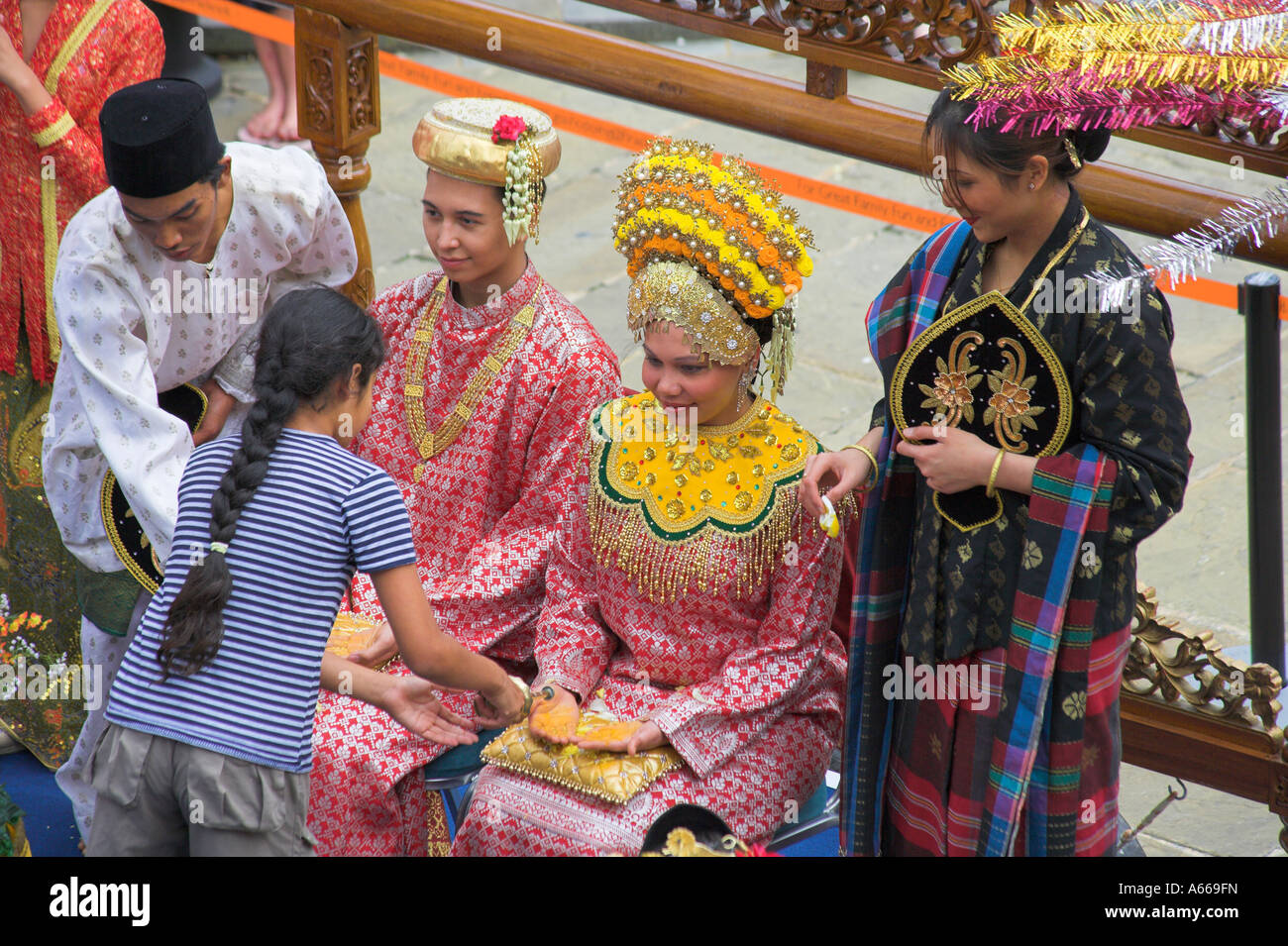 Giving of gifts at a Malaysian wedding ceremony Stock Photo - Alamy