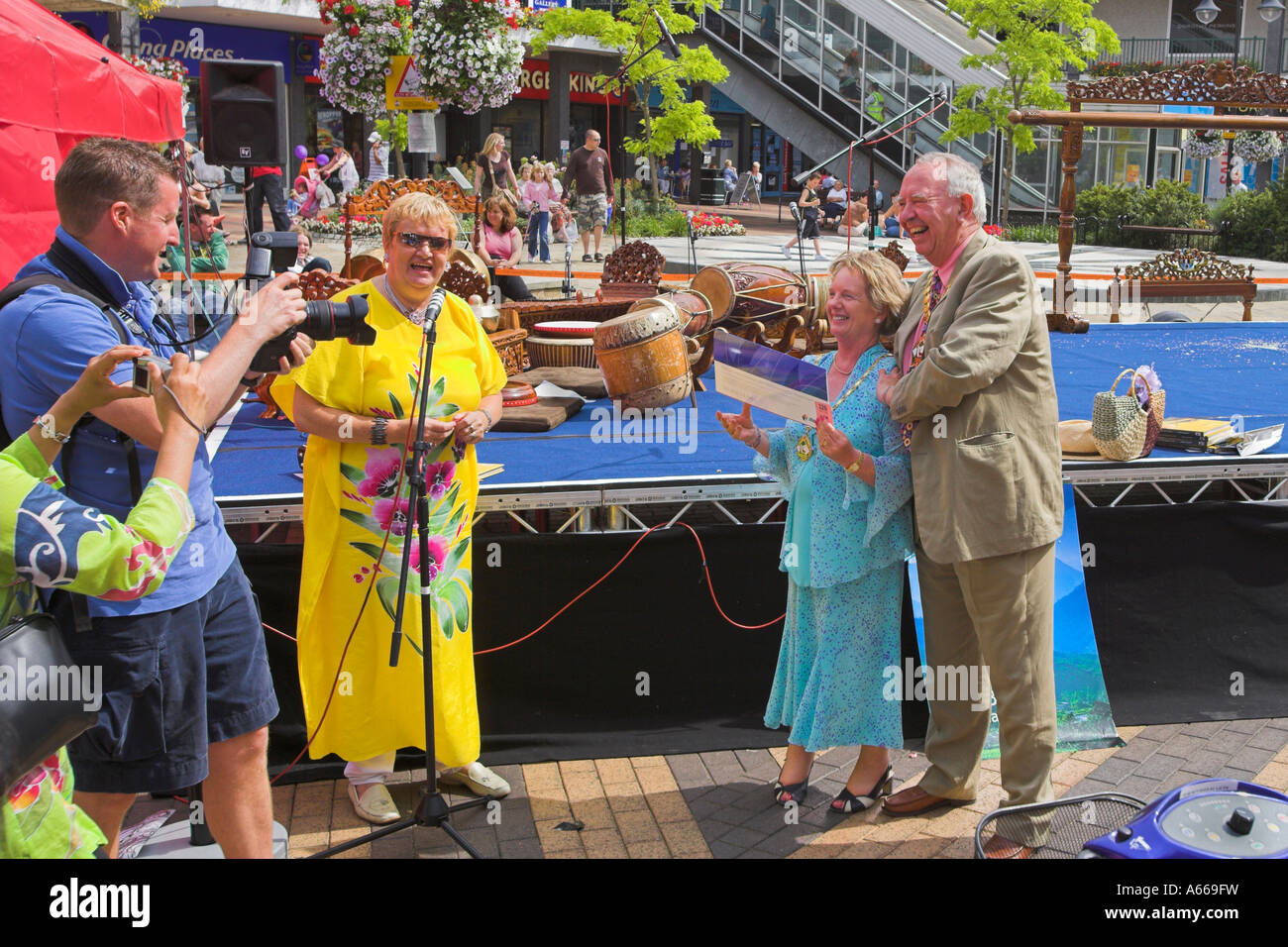 The Mayor and Mayoress being photographed at the Malaysian festival ...
