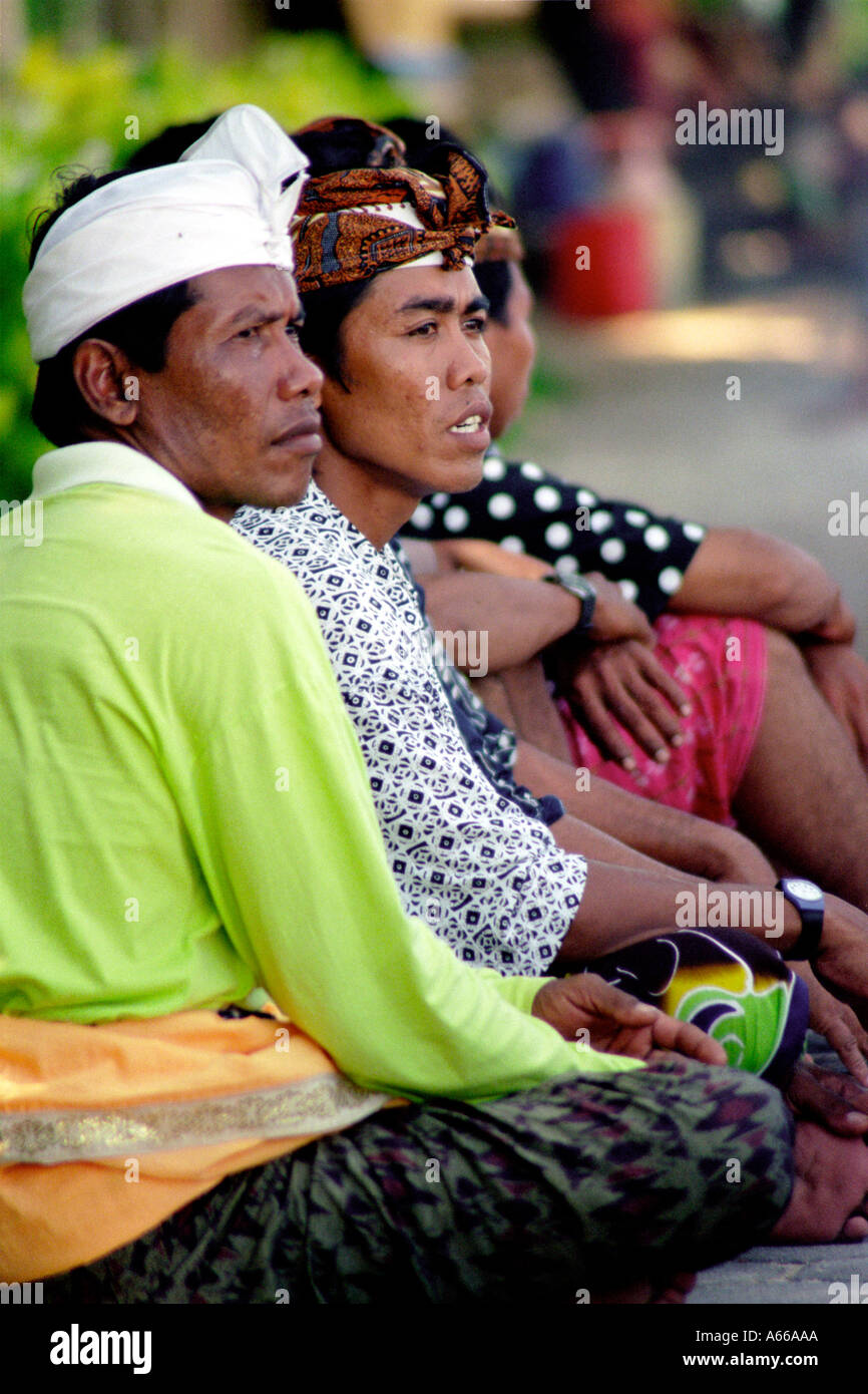Indonesian men spend the afternoon at the seashore Stock Photo - Alamy