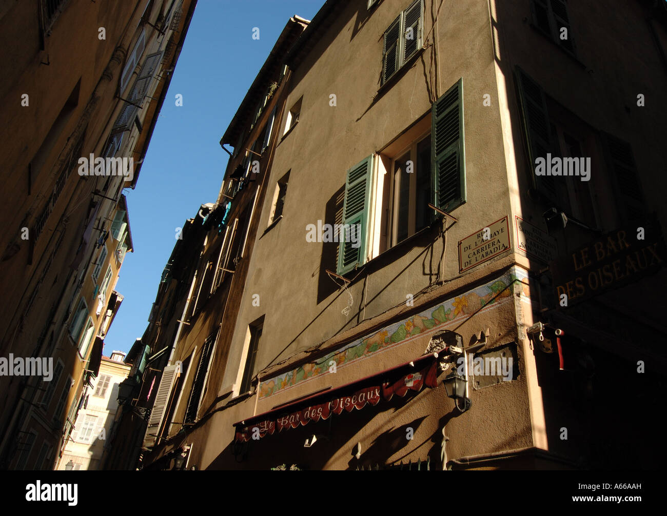 Narrow street in old town of Nice, France Stock Photo - Alamy