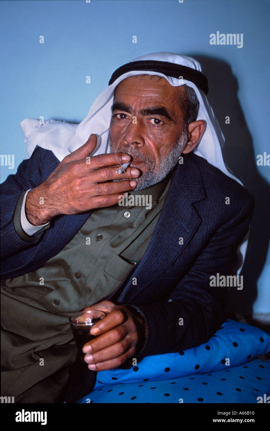 Muslim smoking cigarette hi-res stock photography and images - Alamy