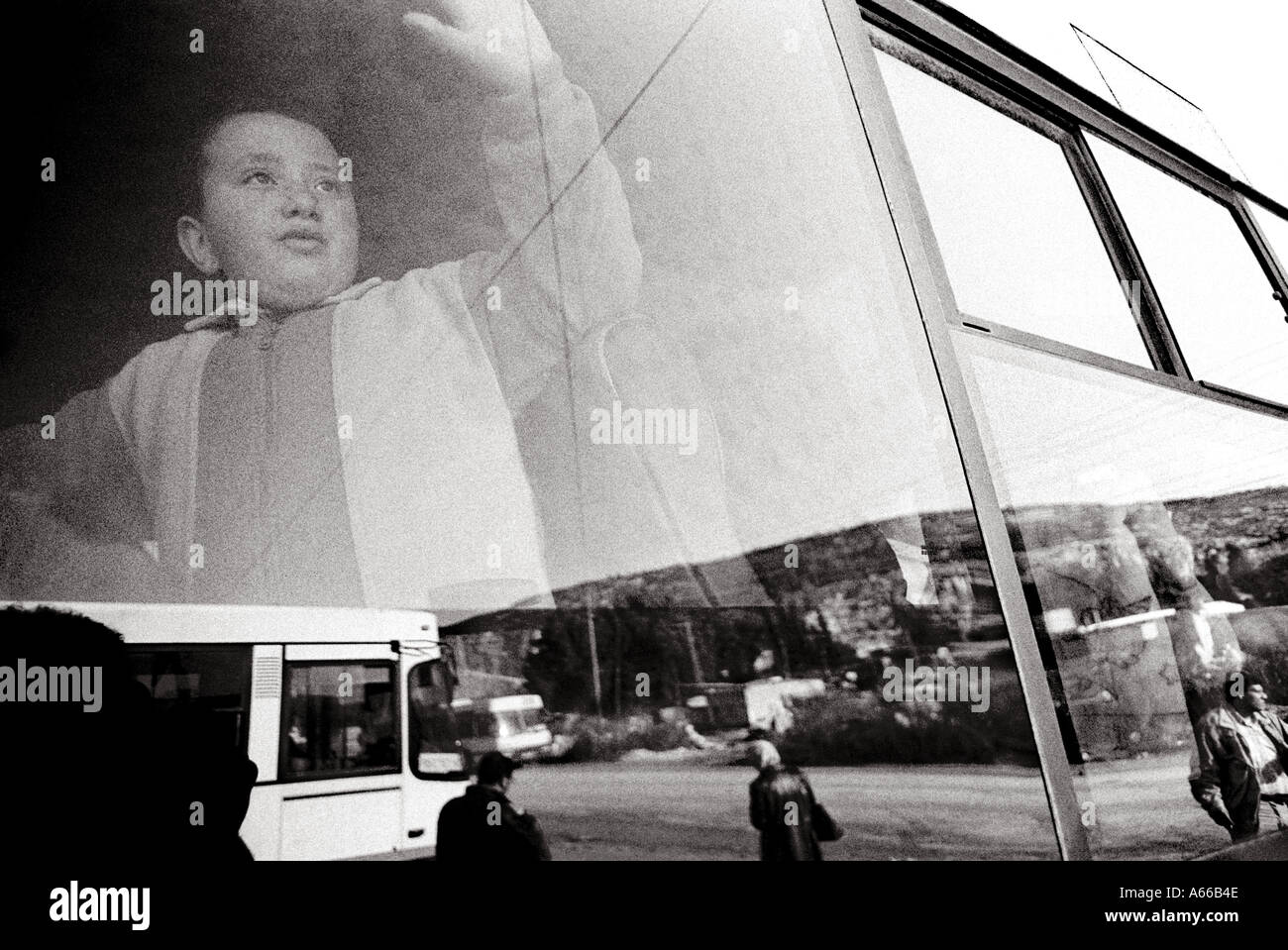 Boy inside a bus at Nablus check point waiting for departure, West Bank ...