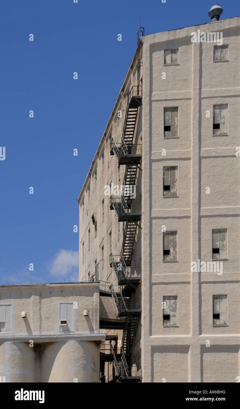Fire escape on the giant grain elevator and storage tanks built in the ...