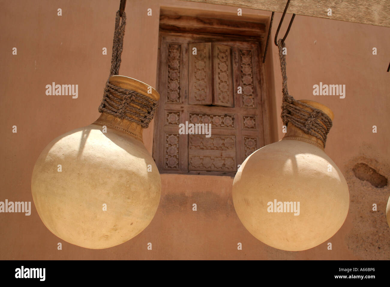 Oman, Water cooling clay pottery in a Fort in an attractive fishing ...