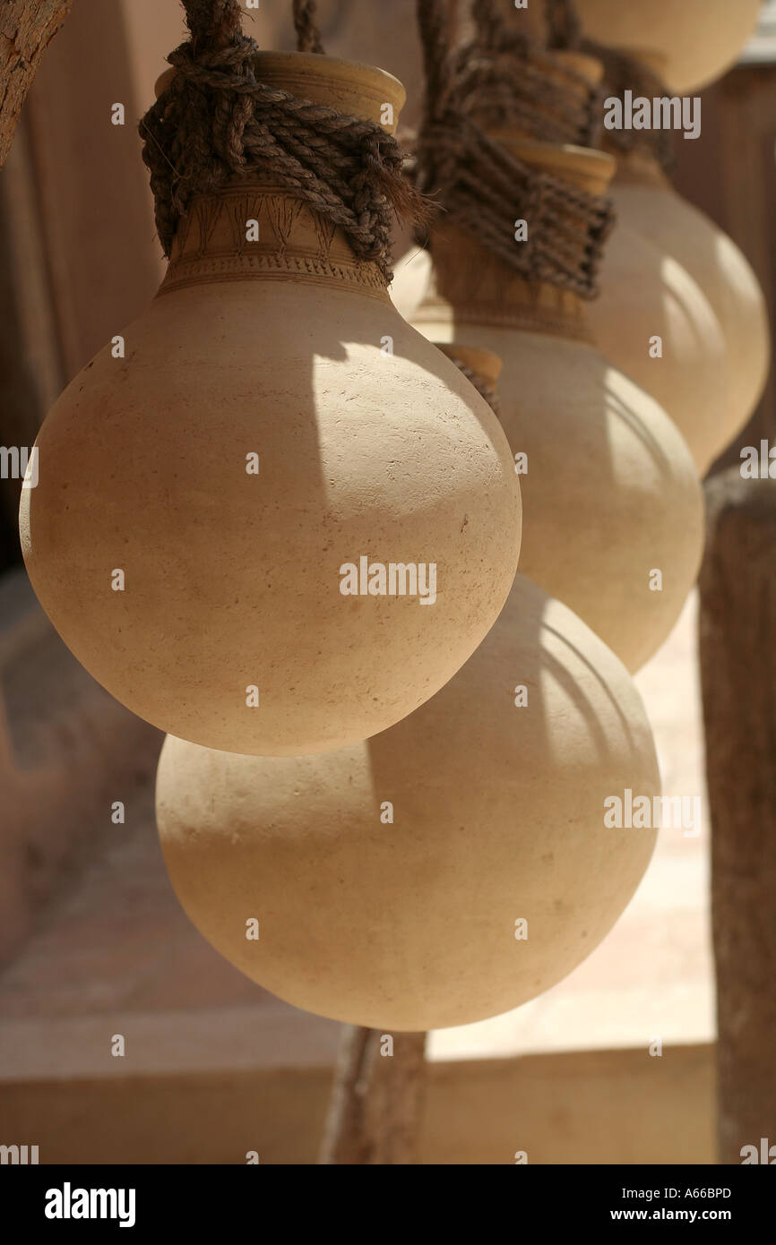 Oman, Water cooling clay pottery in a Fort in an attractive fishing ...