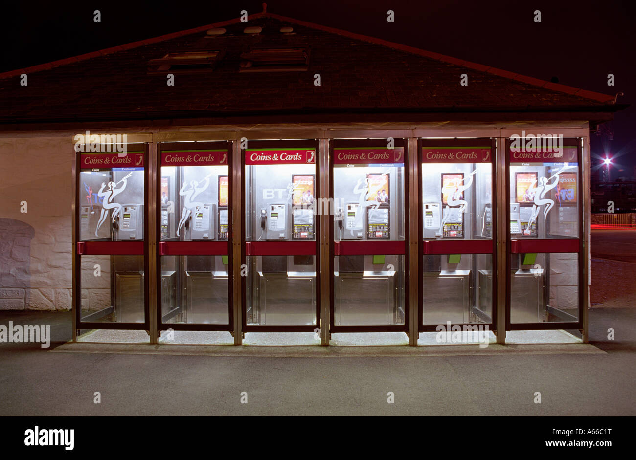 A line of public telephone boxes in falmouth cornwall used for phoning ...