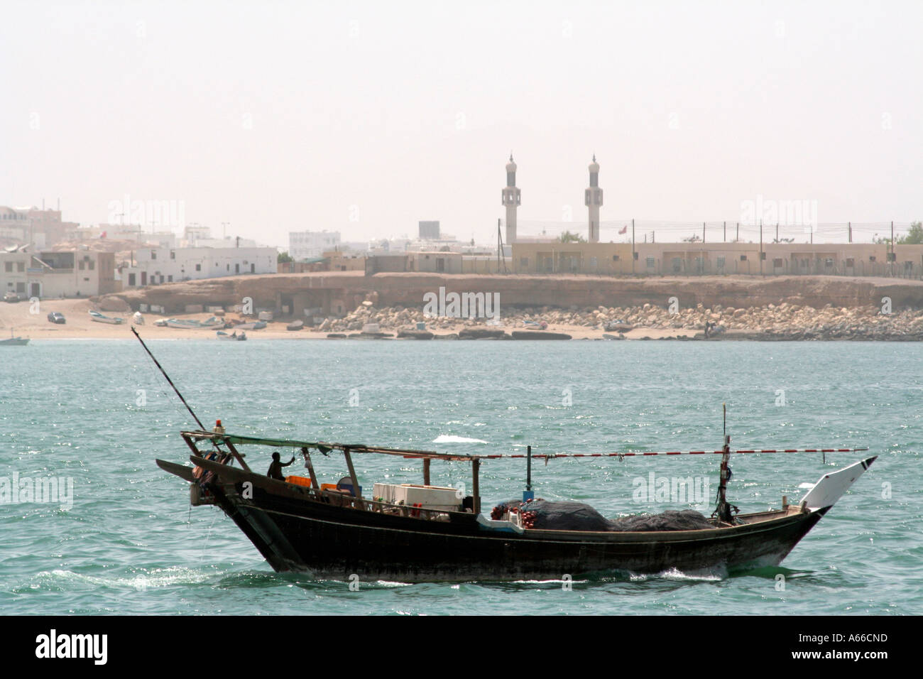 Traditional arab sailing vessels, dhow in motion in Sur Oman Stock ...