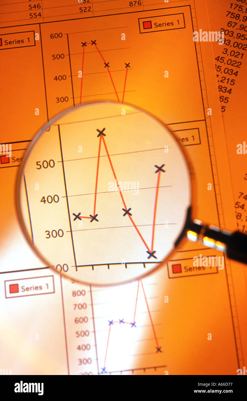 Graph through a magnifying glass Stock Photo - Alamy