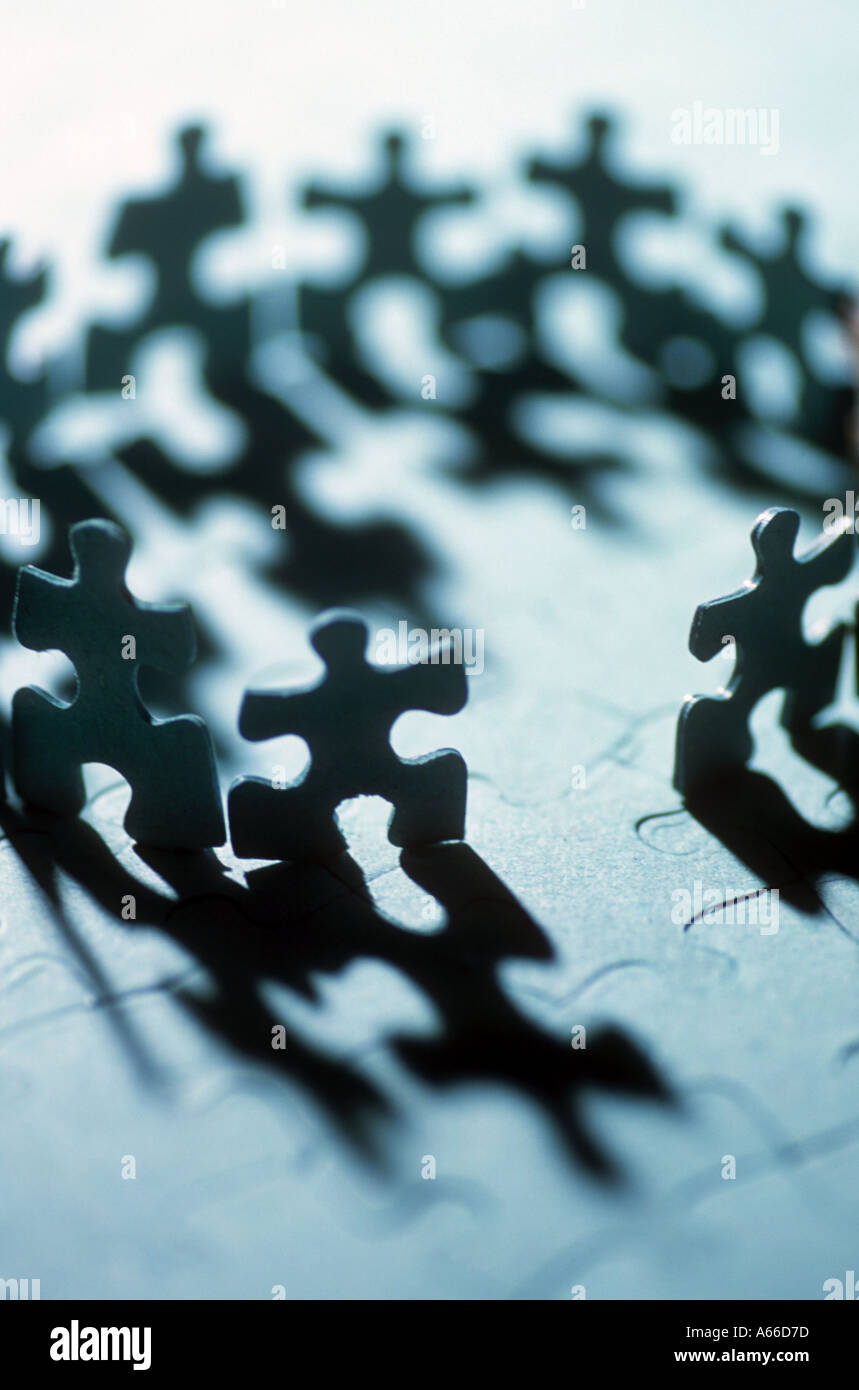 Jigsaw people missing link Stock Photo - Alamy