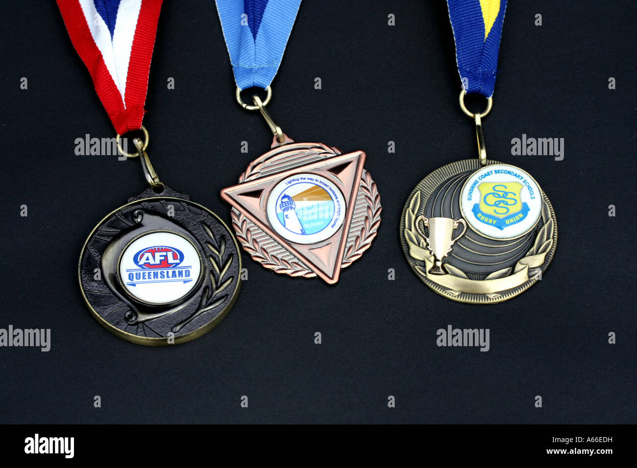 THREE MEDALS AWARDED FOR SPORTING ACHIEVEMENT HORIZONTAL BLACK ...