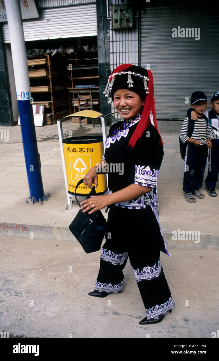 Woman of Hani ethnic minority in traditional dress in the streets of ...