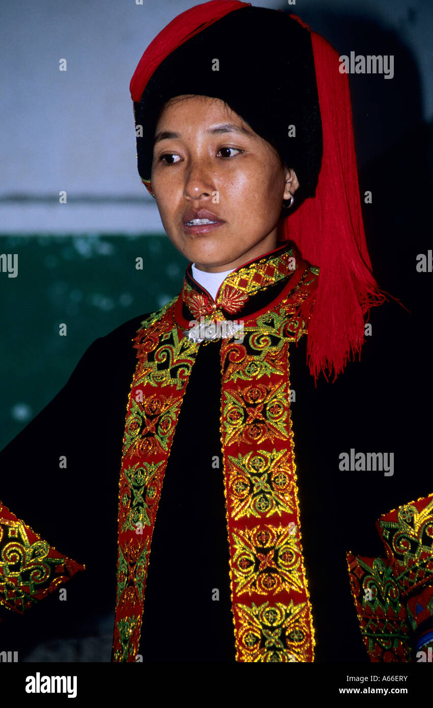 Woman of Hani ethnic minority in traditional dress. Luchung, China ...