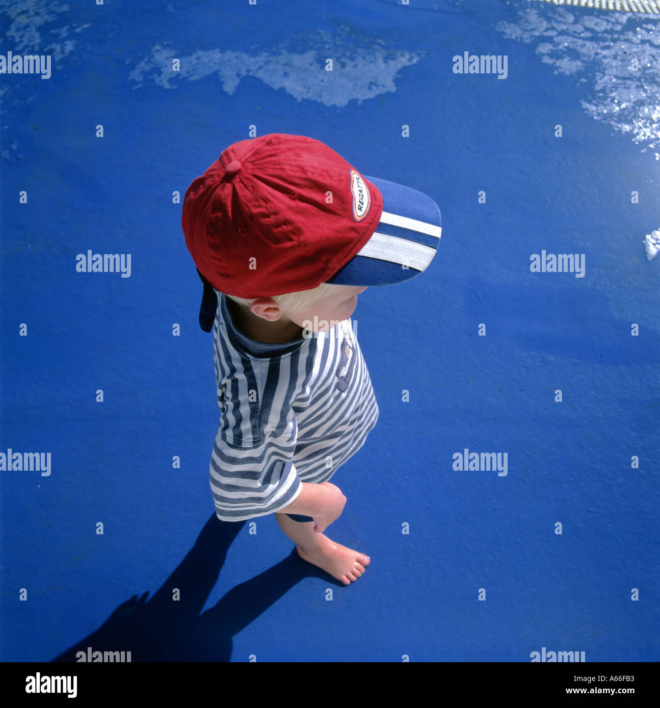 Little boy on deck from above Stock Photo - Alamy