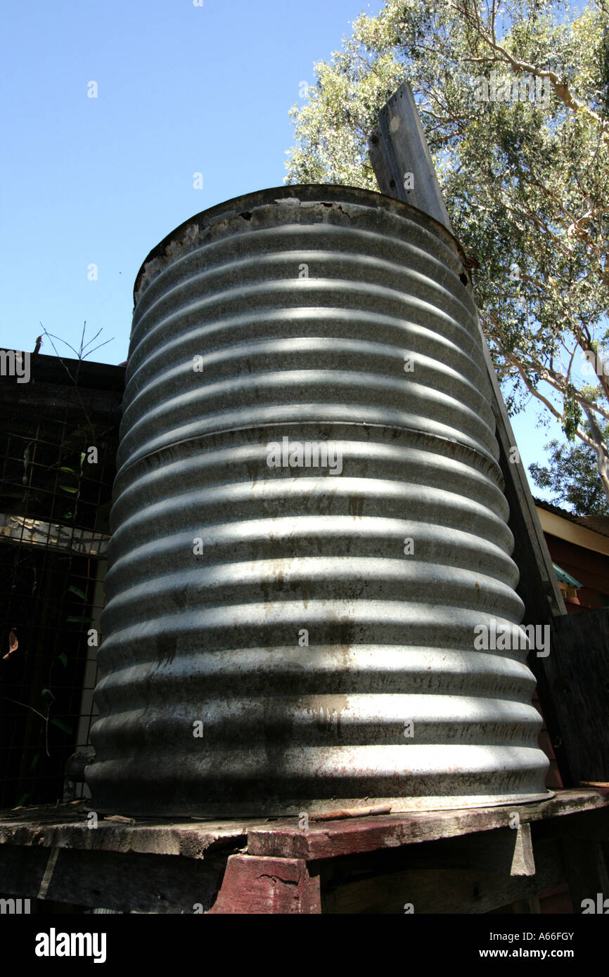 OLD CORRUGATED IRON WATER TANK VERTICAL BDB10356 Stock Photo - Alamy