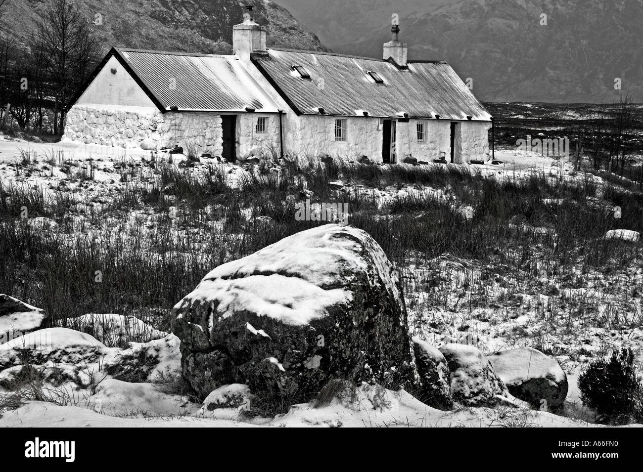 Black rock cottages with snow High Resolution Stock Photography and ...