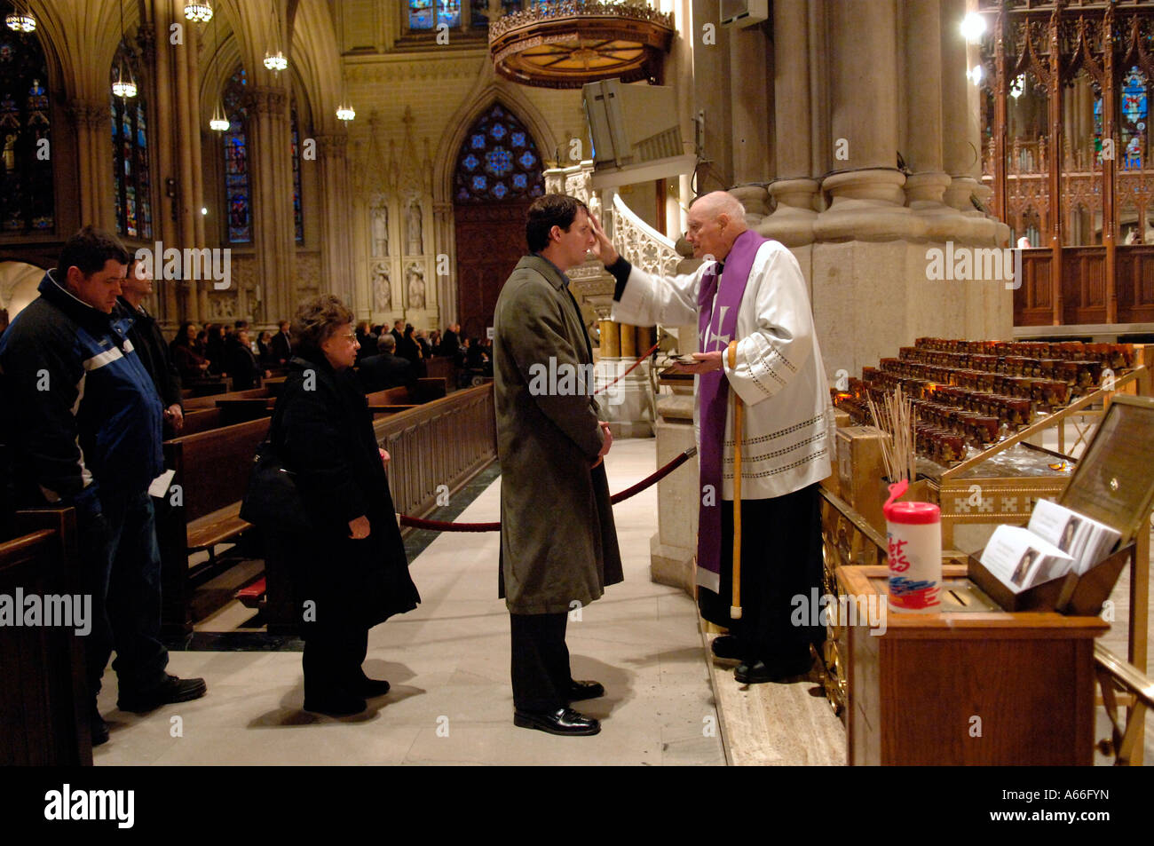 Ash wednesday priest blessing hi-res stock photography and images - Alamy