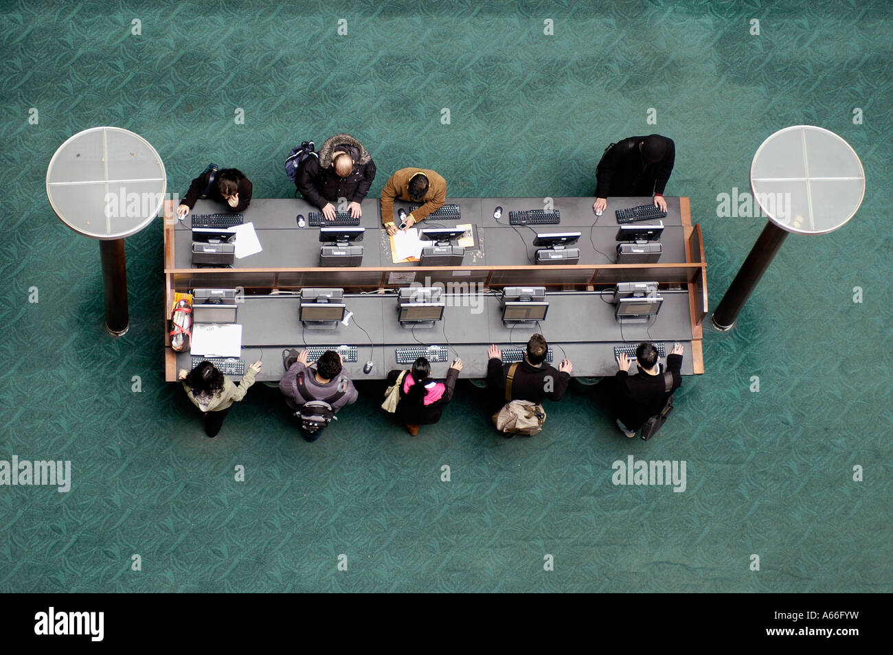 Students at Baruch College in nYC use public computer terminals to ...