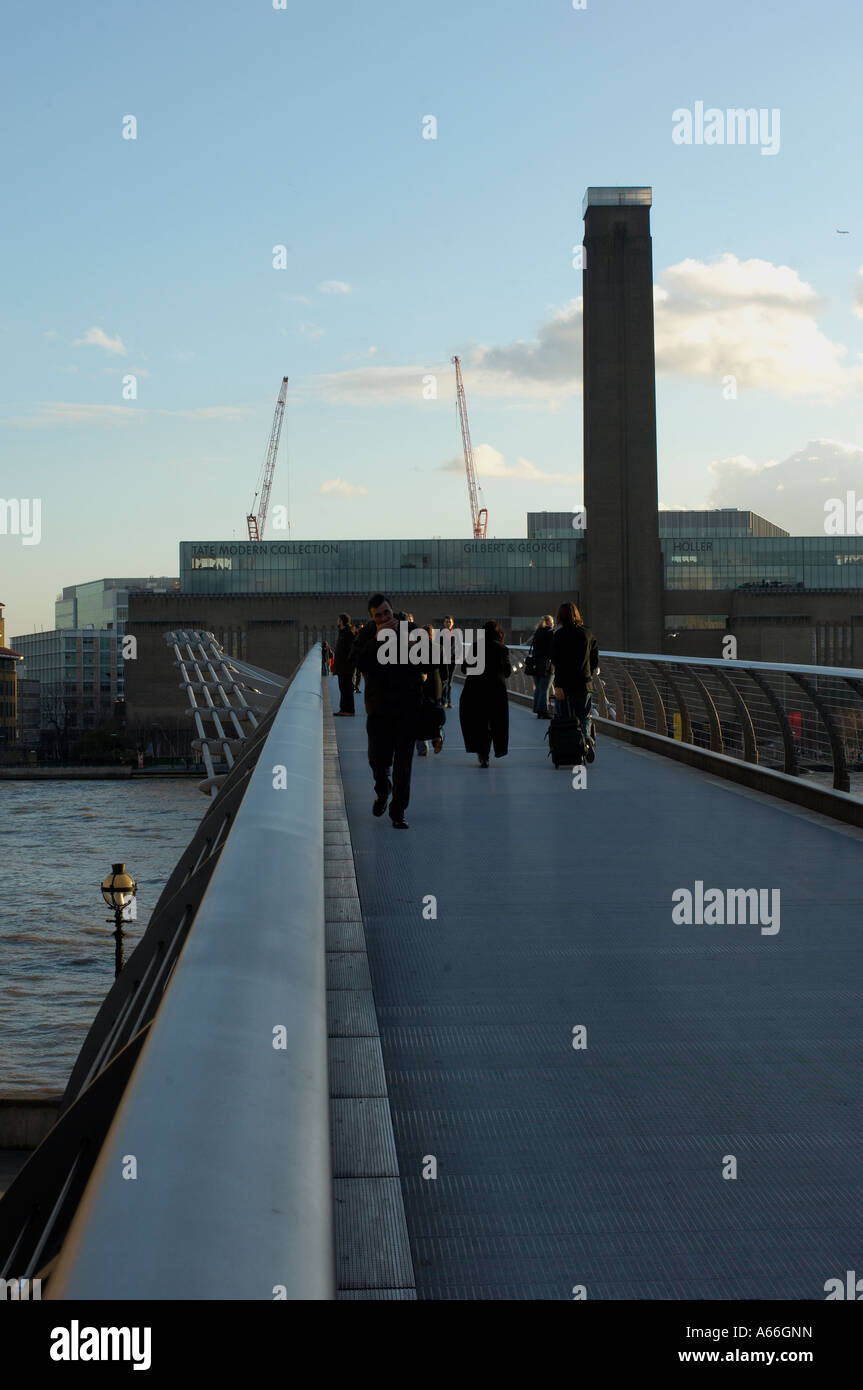 People on Millenium Bridge with Tate Modern in background Stock Photo ...