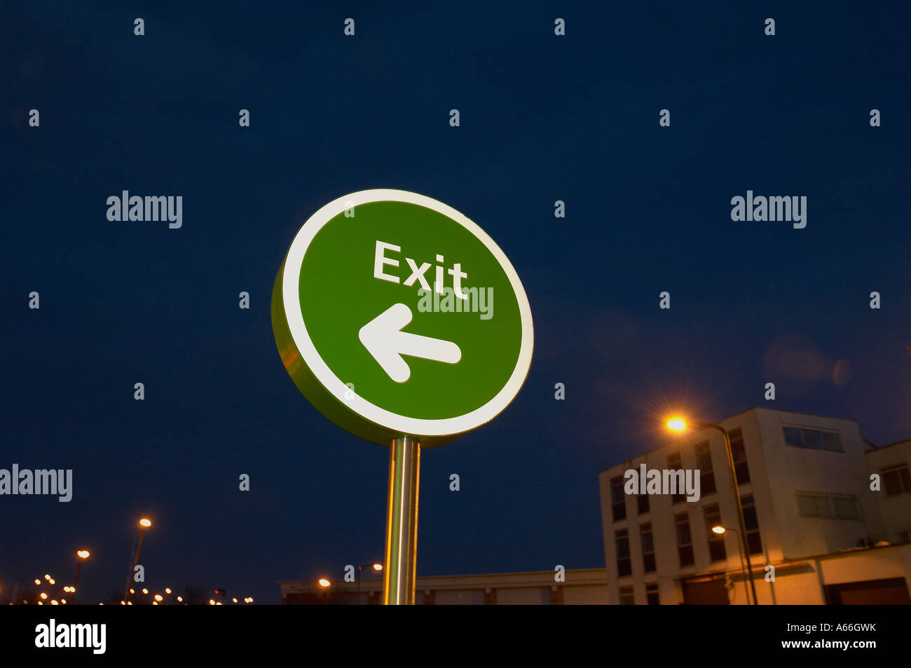 Car-park exit sign at night Stock Photo - Alamy