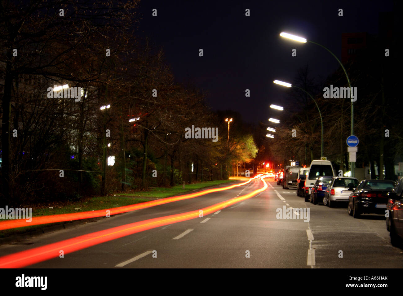 car lights trace on road at night Stock Photo - Alamy