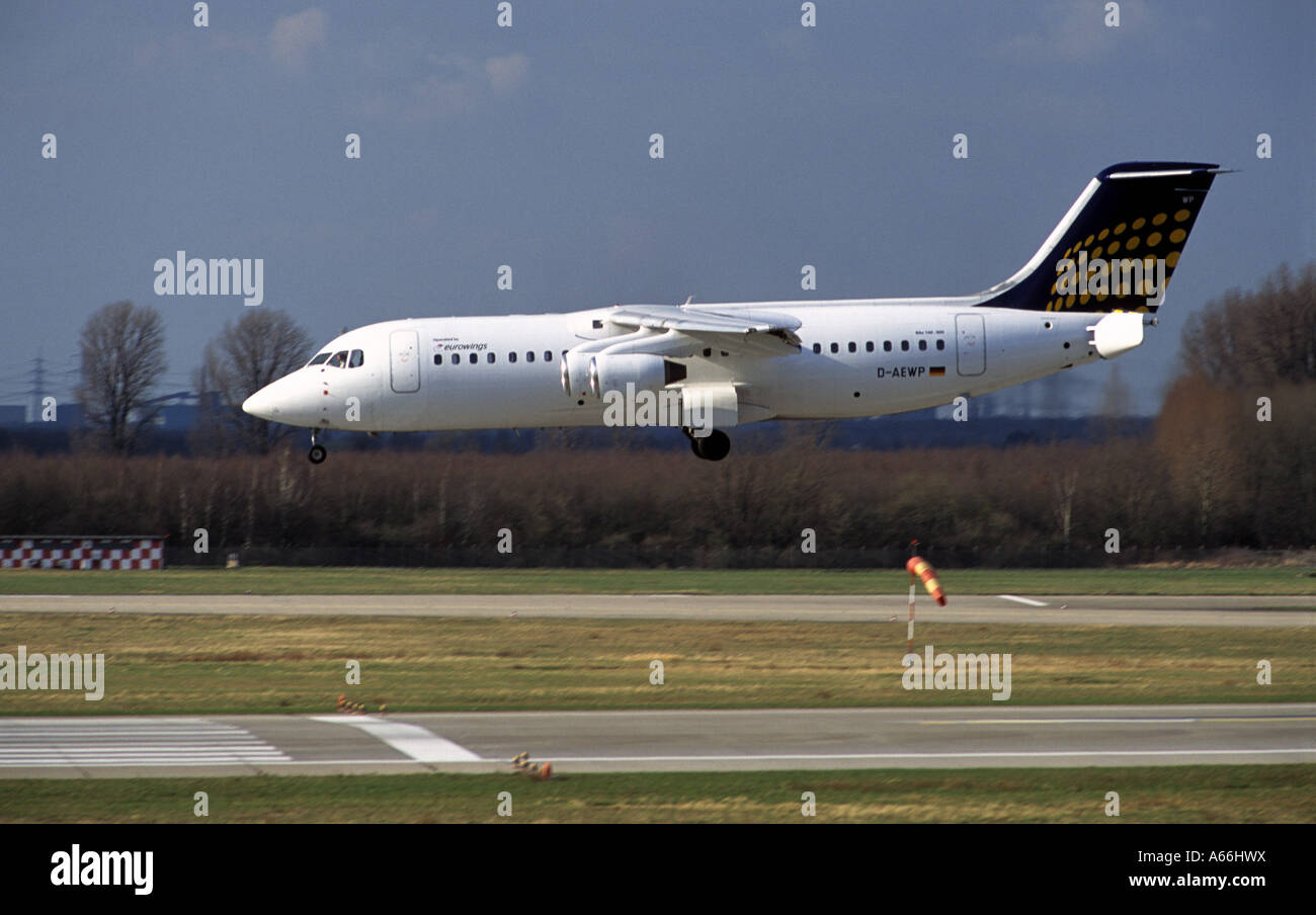 Lufthansa BAE 146 passenger airliner landing at Dusseldorf ...