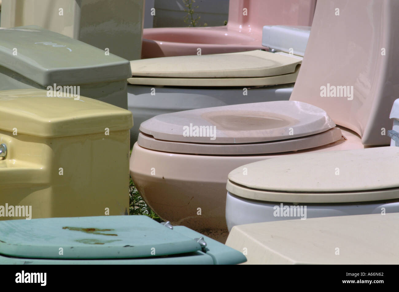 old toilets bathroom potties potty rows used Stock Photo - Alamy