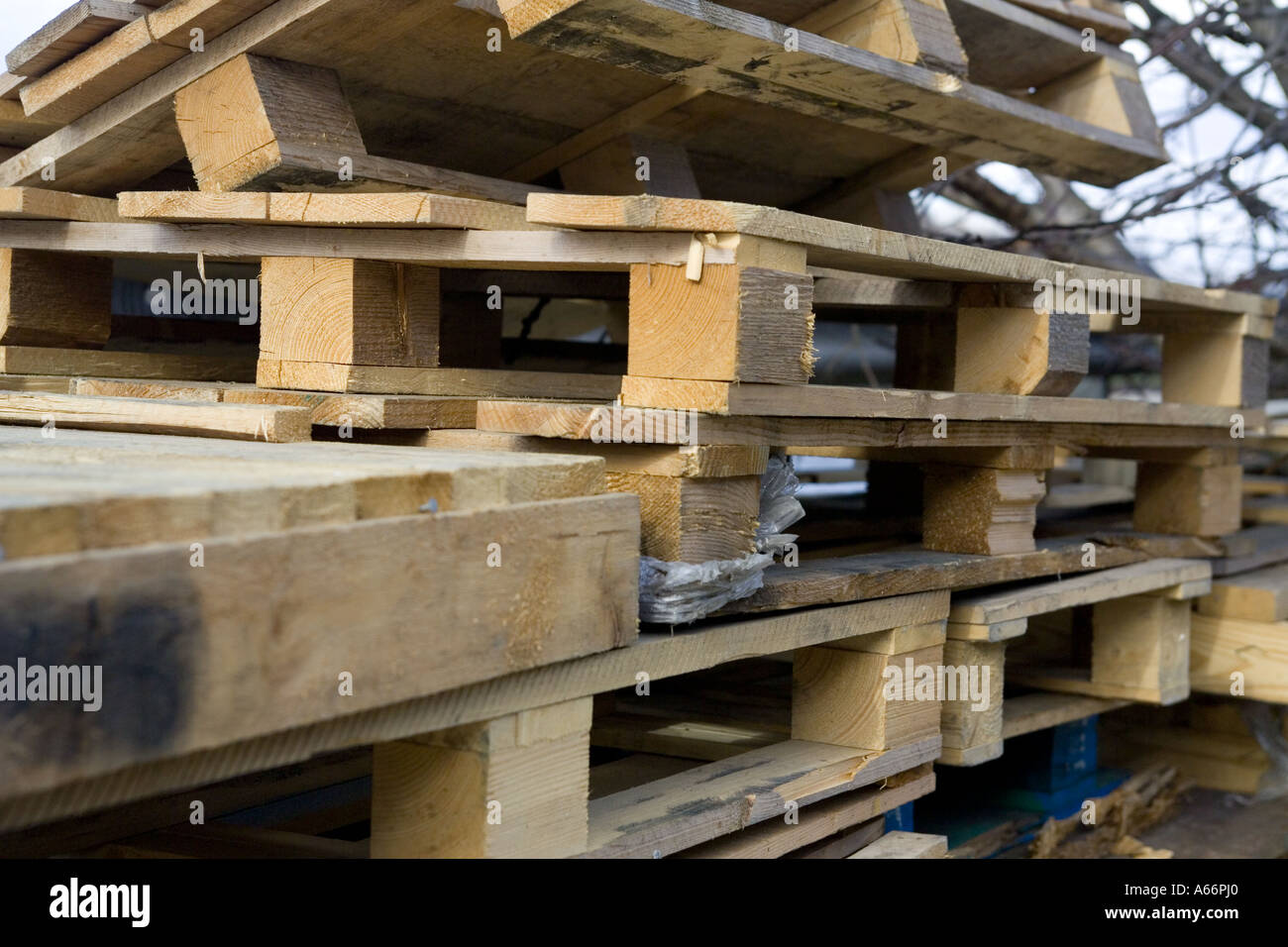 Wooden pallets in a heap Stock Photo - Alamy