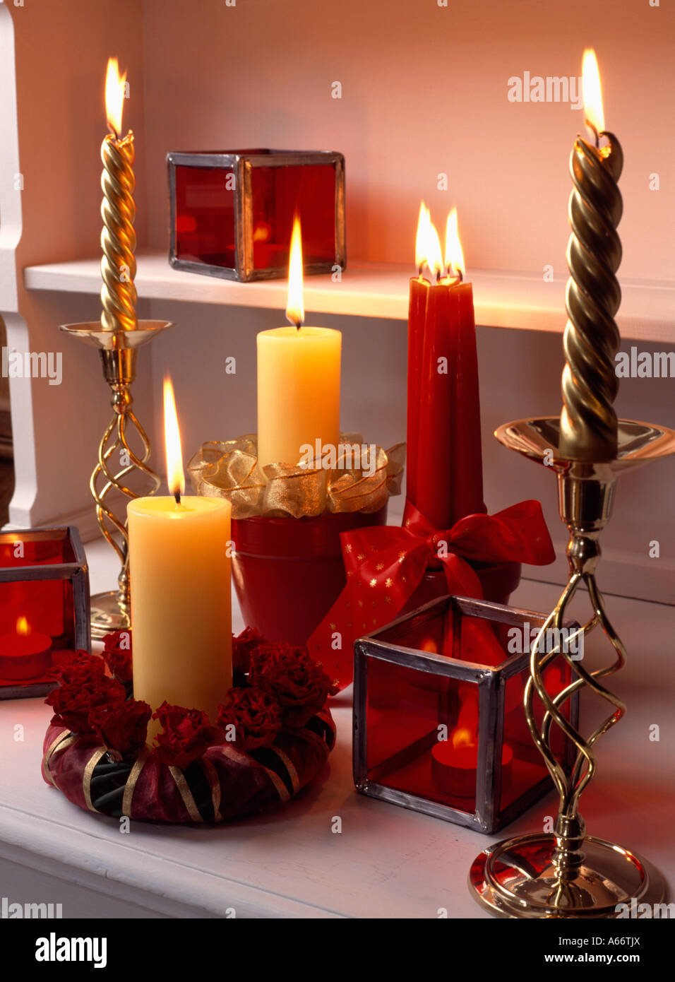 Group of red gold and cream candles Stock Photo - Alamy