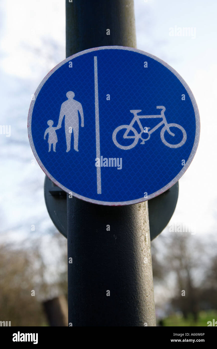 Walking, cycling, sign post, warning, Sign Stock Photo - Alamy