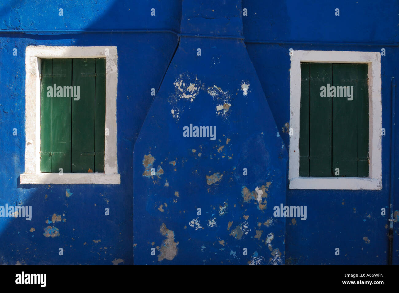 Detail of a royal blue house in Burano, island of the lagoon of Venice ...