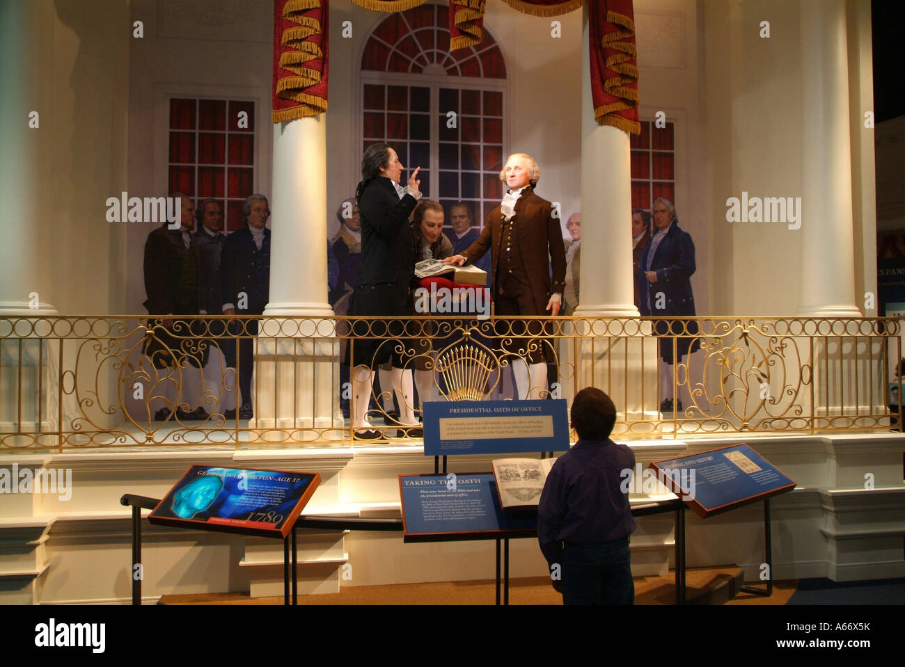 The life size diorama shows Washington taking the oath of office on a ...