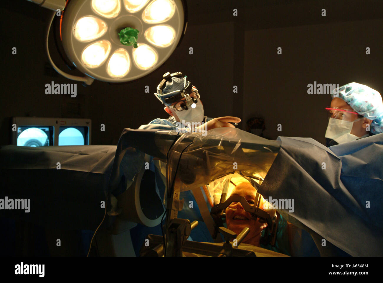Brain surgeon performs a delicate brain procedure on an awake patient ...