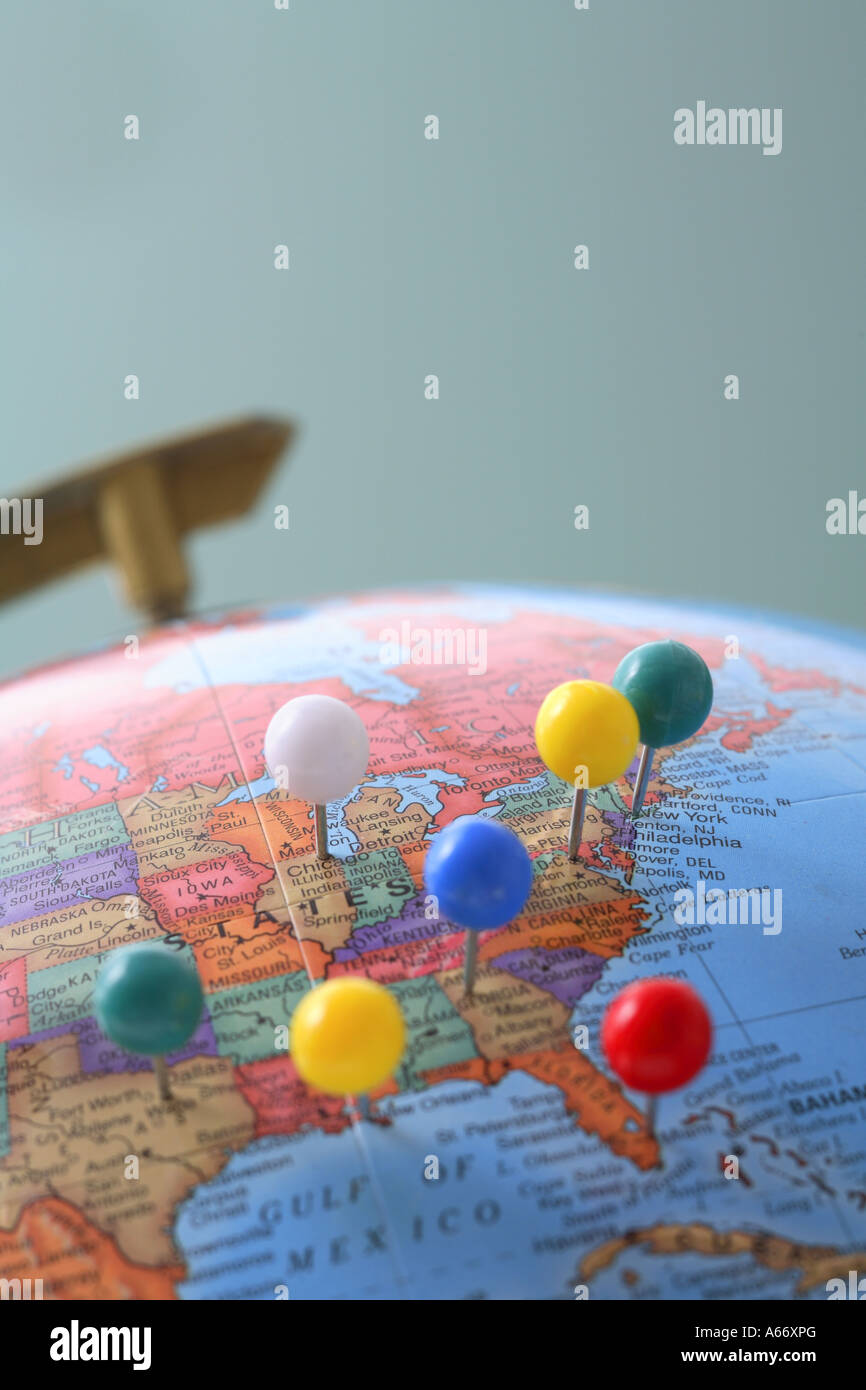 Globe with pins Stock Photo - Alamy