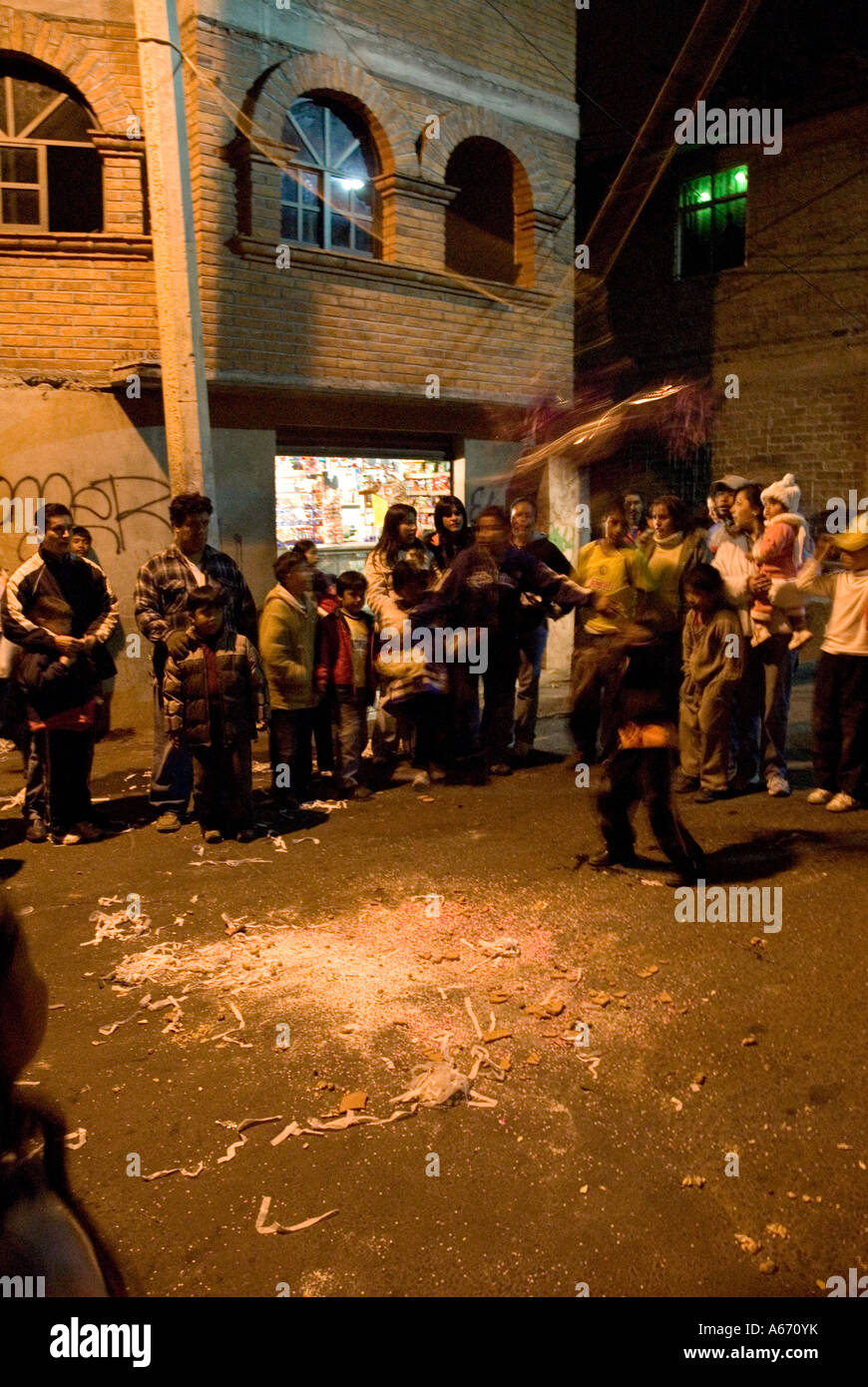 breaking the pinata - christmas game at night - mexico city Stock Photo ...