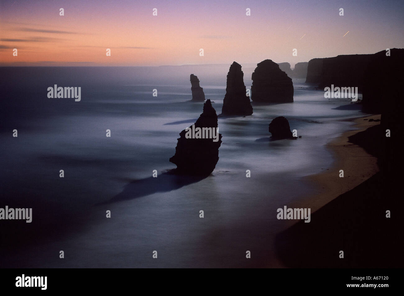Famous rock formation The Twelve Apostles Australia in moonlight Stock ...