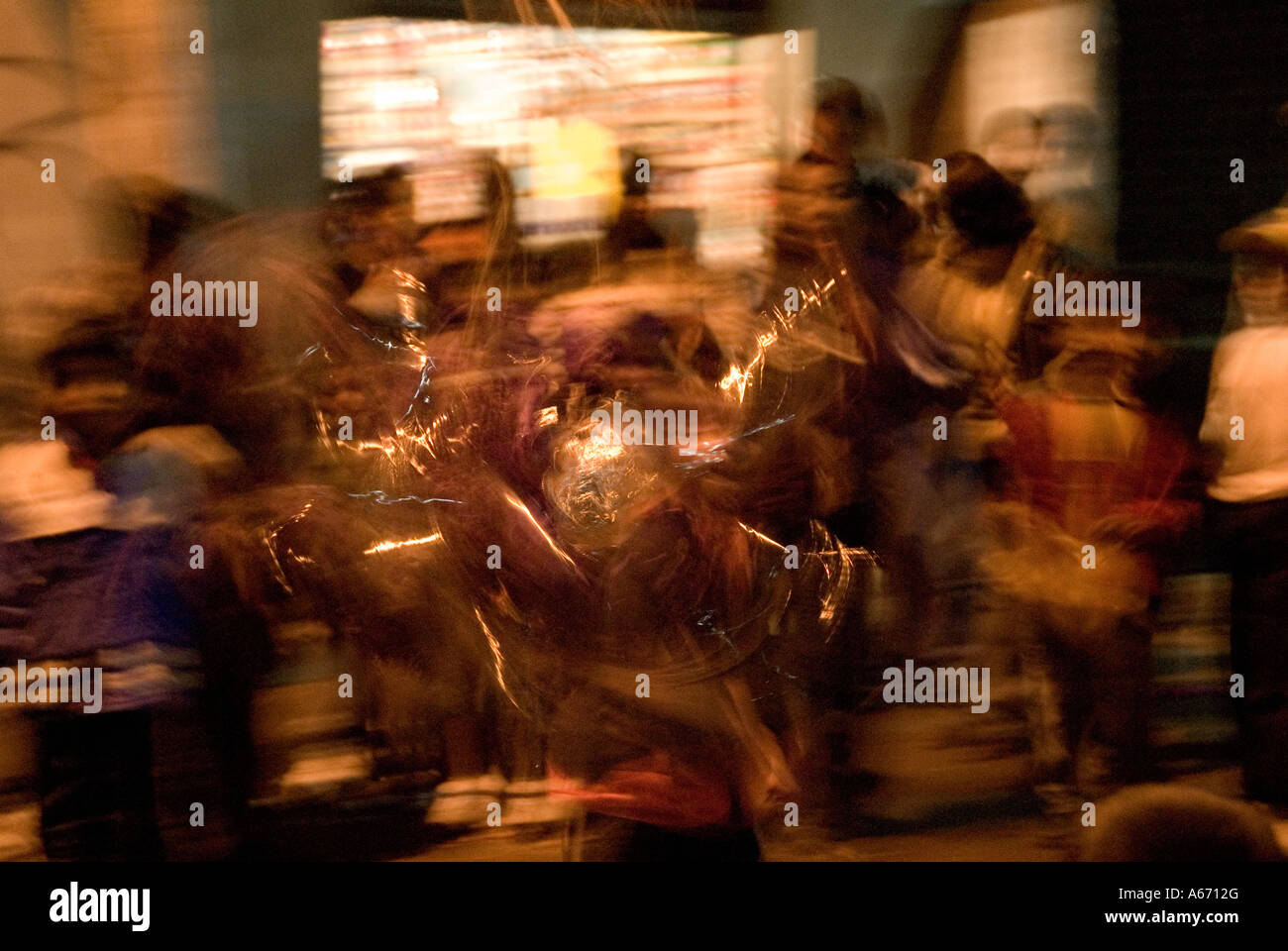 breaking the pinata - christmas game at night - mexico city Stock Photo ...