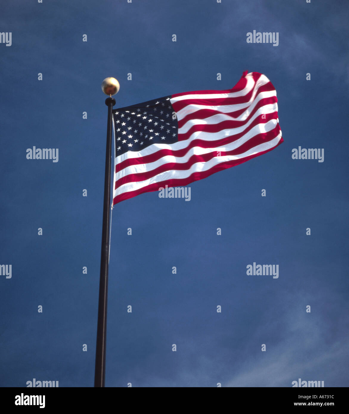 American flag waving in wind Stock Photo - Alamy