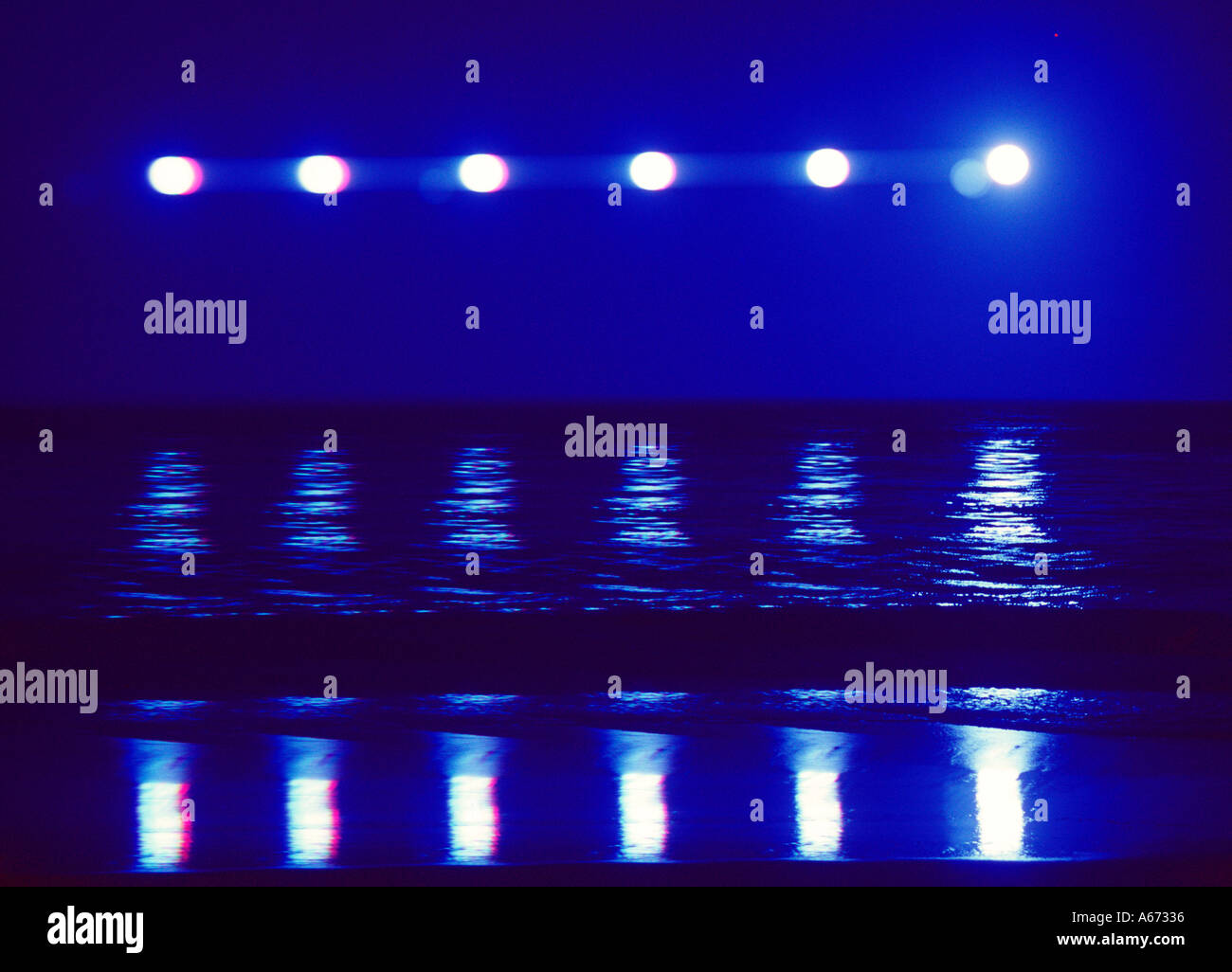 Moon rise multiple exposure over ocean Stock Photo - Alamy