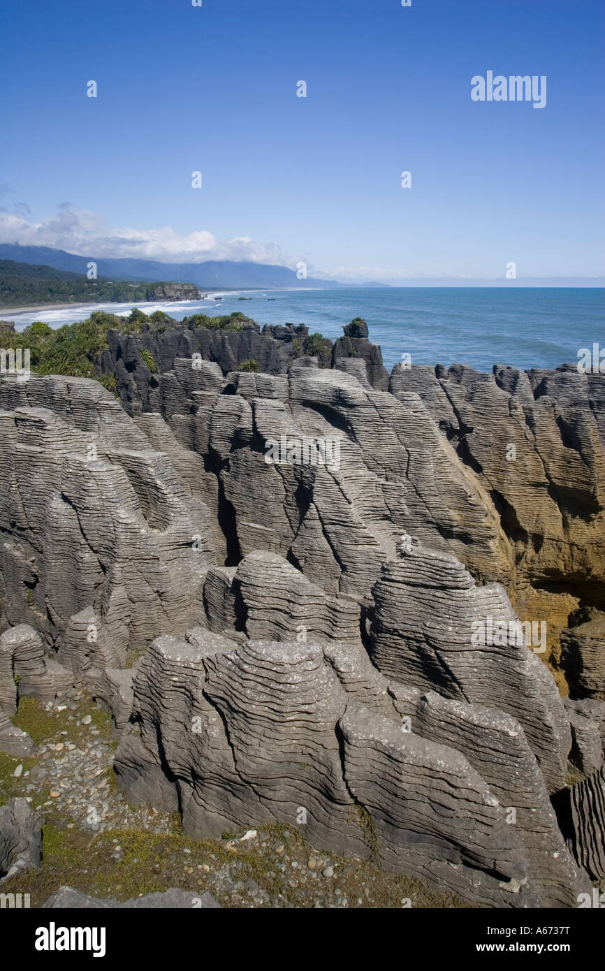Layered limestone rocks in cliffs at Pancake Rocks Punakaiki South ...