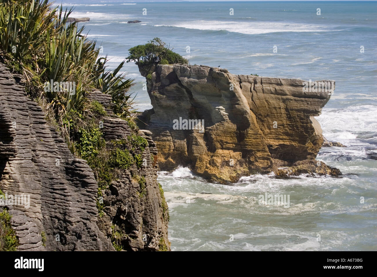 Limestone outcrops on cliffs and offshore Punakaiki South Island New ...
