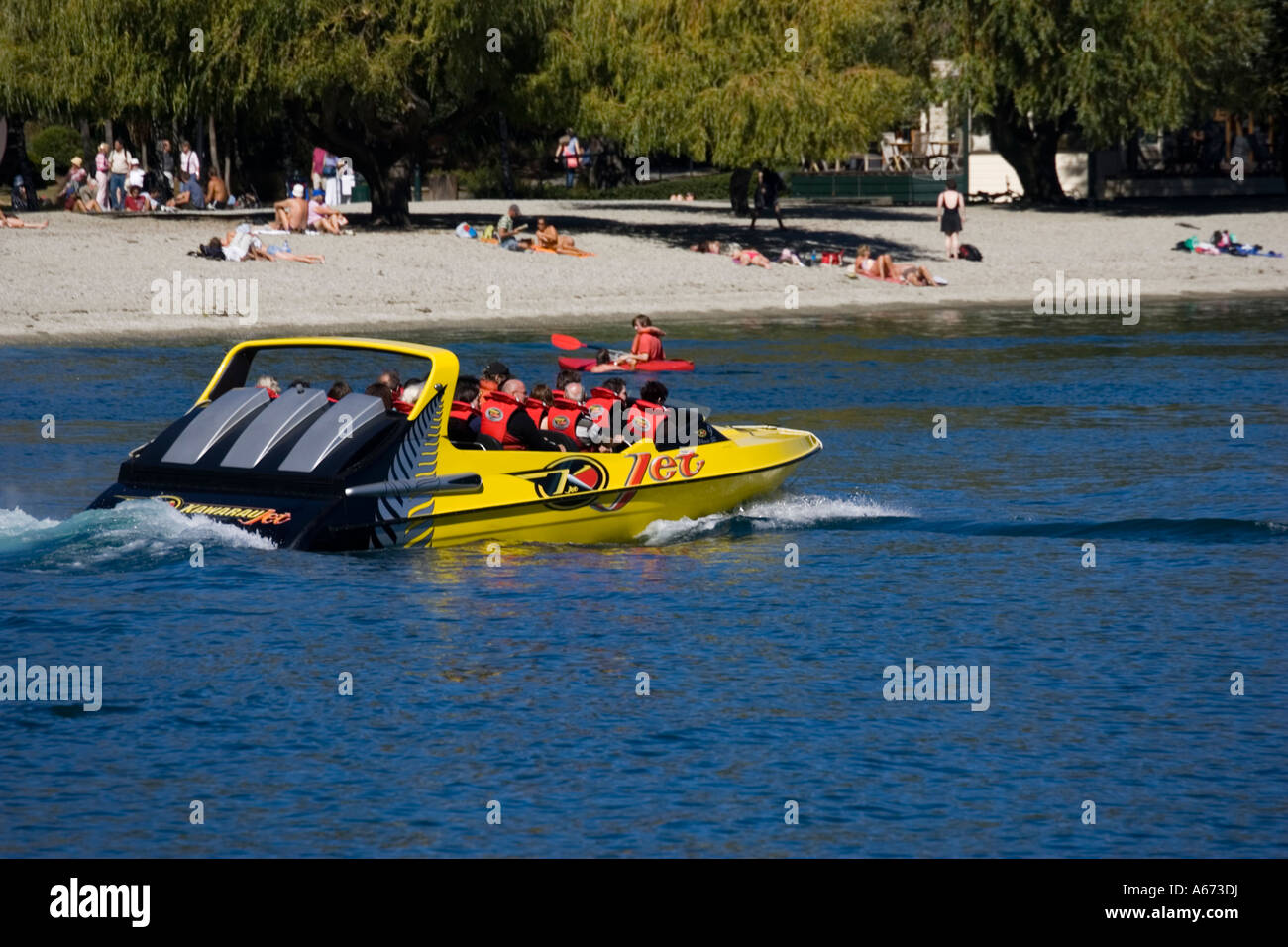 Yellow jet boat on Lake Wakatipu Queenstown South Island New Zealand ...