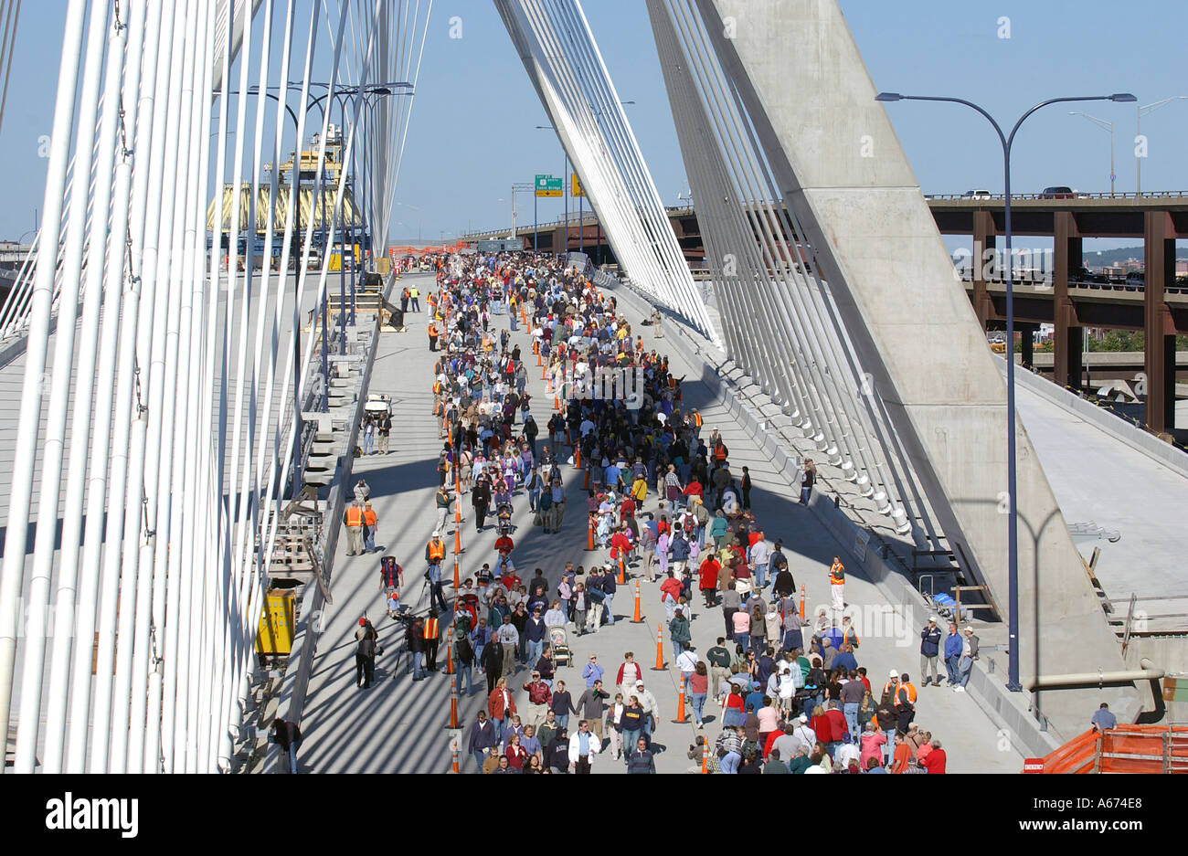 Visitors walk on the newly completed Zakim Bridge before opening to ...