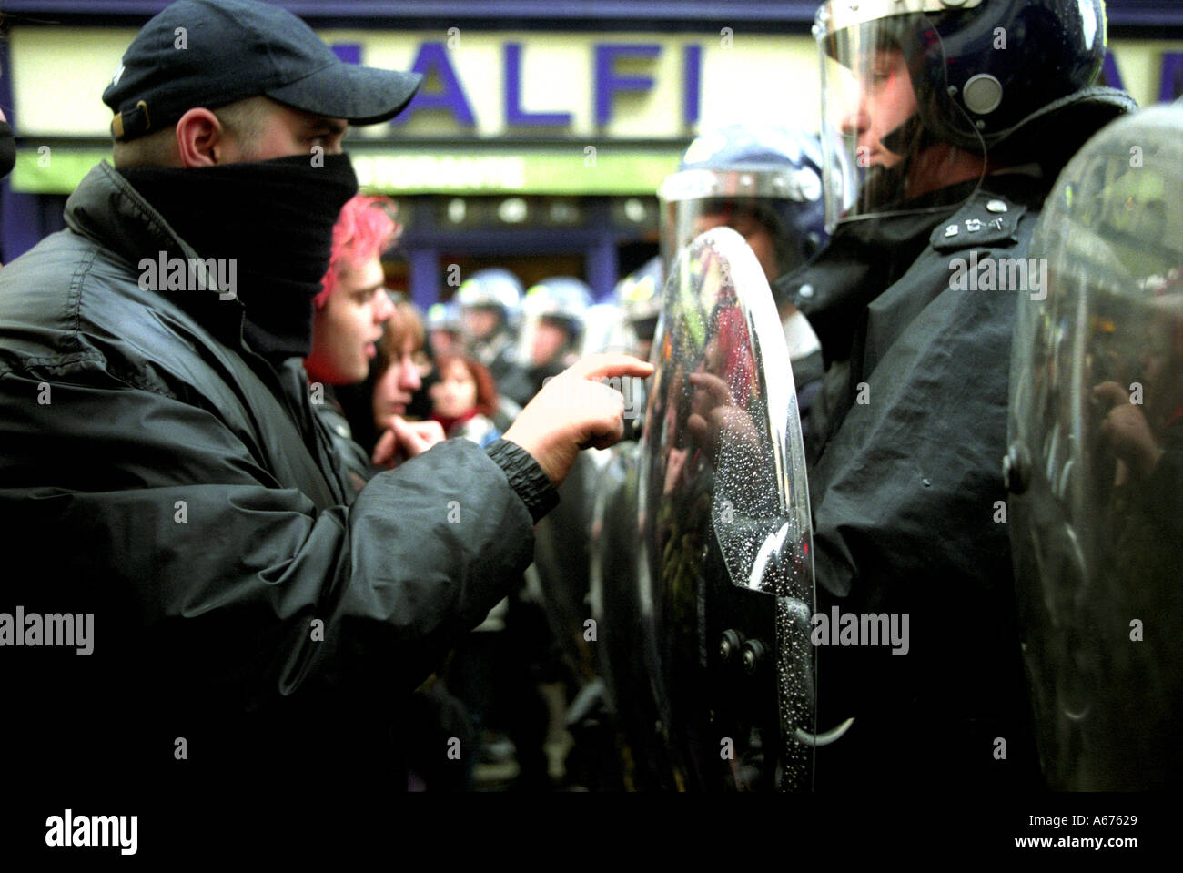 Policemen police officers protesting uniform helmet hi-res stock ...