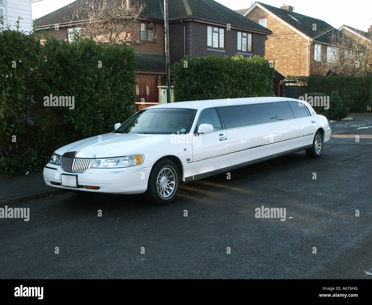 Stretch Limousine arrives outside house to take customers to a London ...