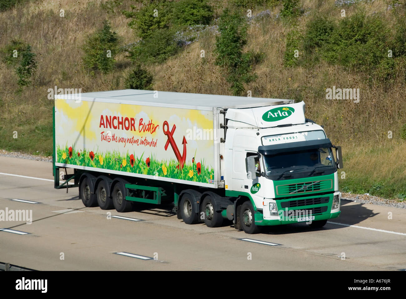 M25 motorway Anchor Butter articulated trailer behind a Arla Foods ...