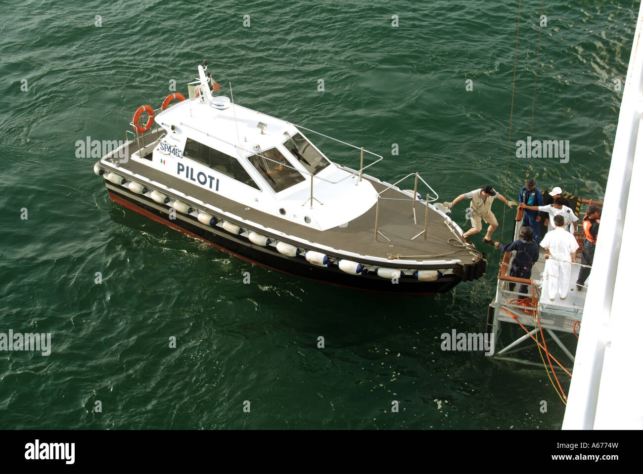 Piloti motor boat launch alongside cruise ship crew assist visiting ...