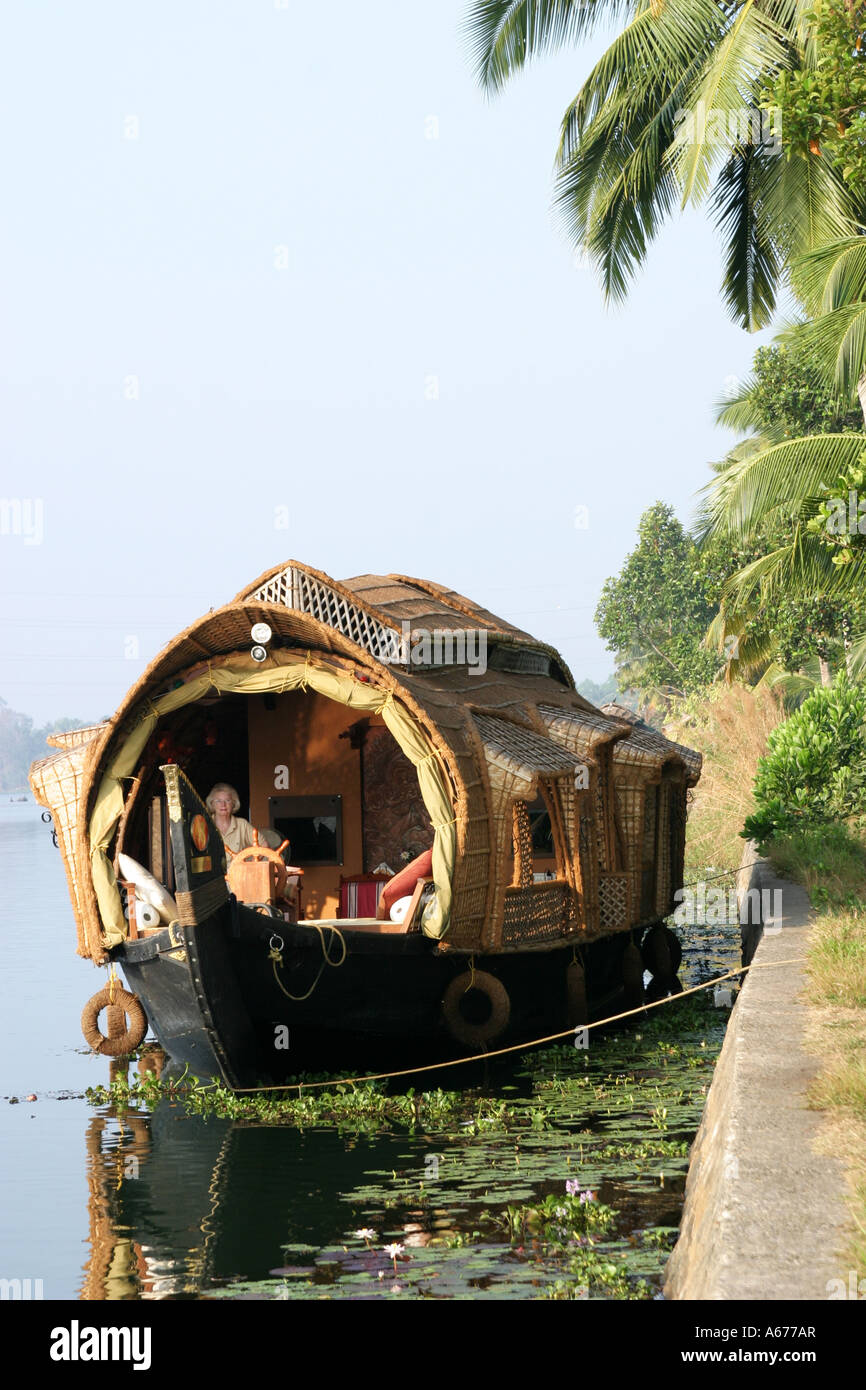 Converted rice barge for tourists at anchor on the Kerala backwaters ...