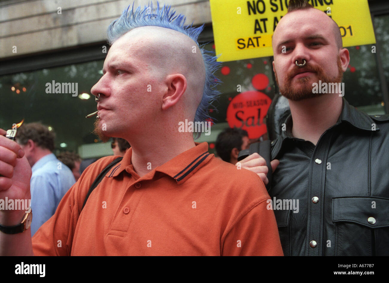Punks in street smoking Stock Photo - Alamy