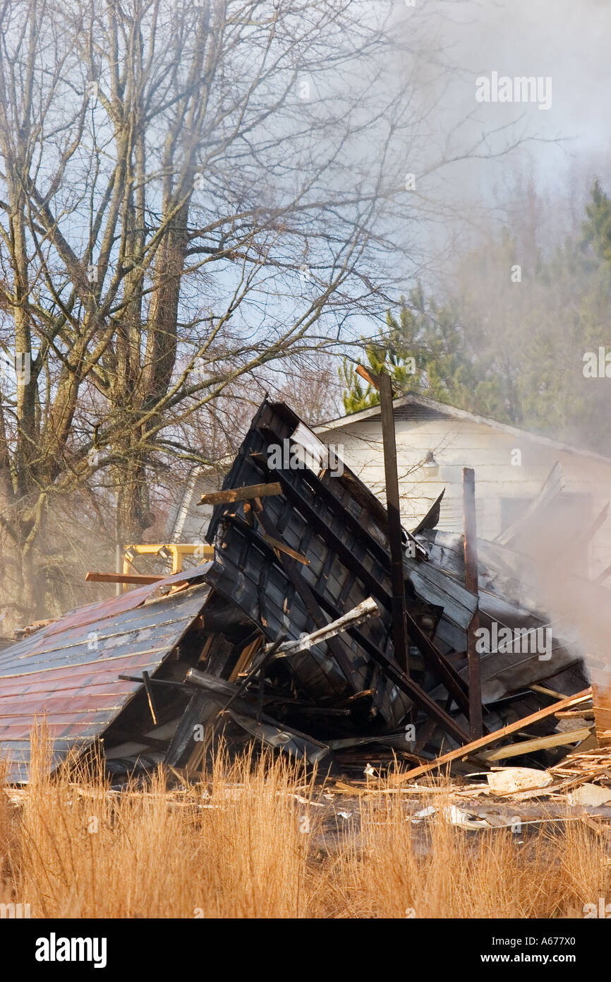 Bulldozer demolishing house Stock Photo - Alamy
