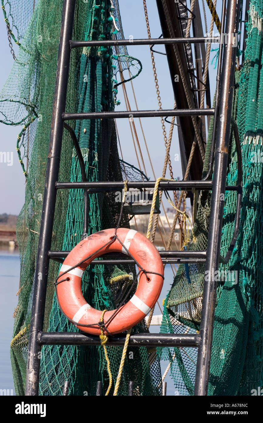 Crop of ladder and nets on shrimp boat Stock Photo - Alamy